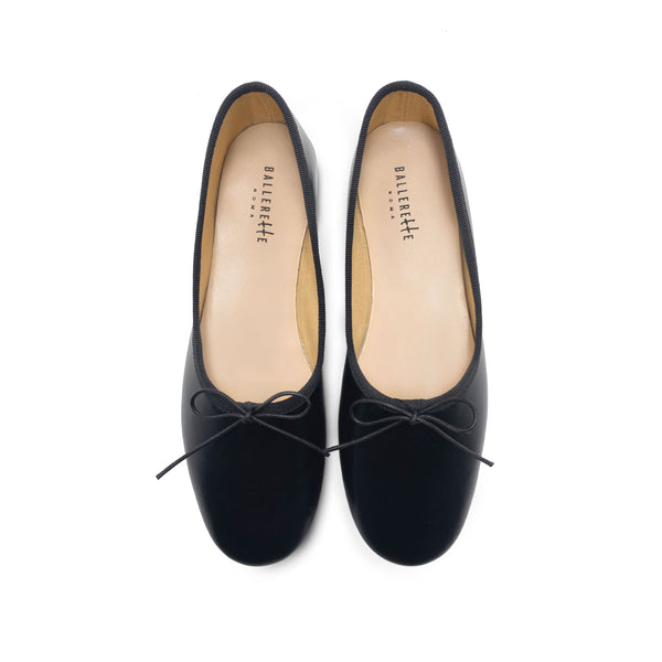 Black leather high-vamp "glove shoes" ballet flats